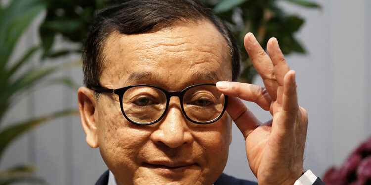 Facing Arrest, Cambodia's Sam Rainsy Vows to Get Home Come What May